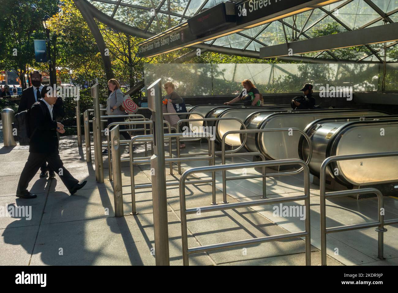 Riders enter and depart the 34th Street-Hudson Yards terminal on the 7 ...