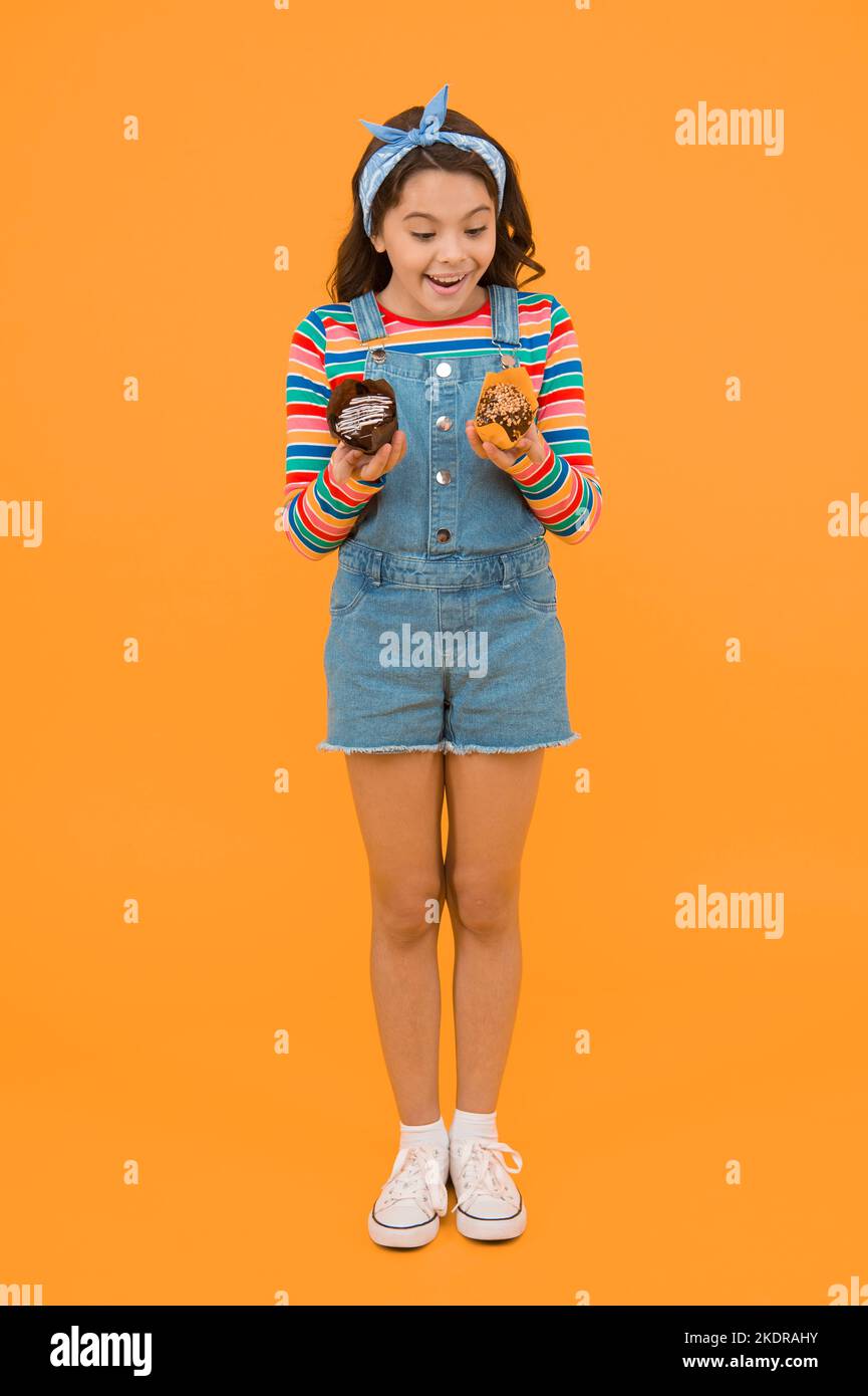 Little girl sweet cupcakes muffin food, sweets and happiness concept ...