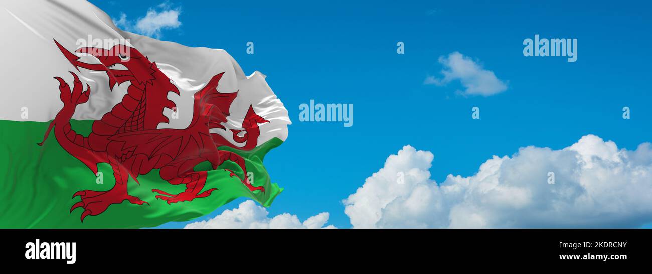 flag of Celtic peoples Welsh people at cloudy sky background, panoramic ...