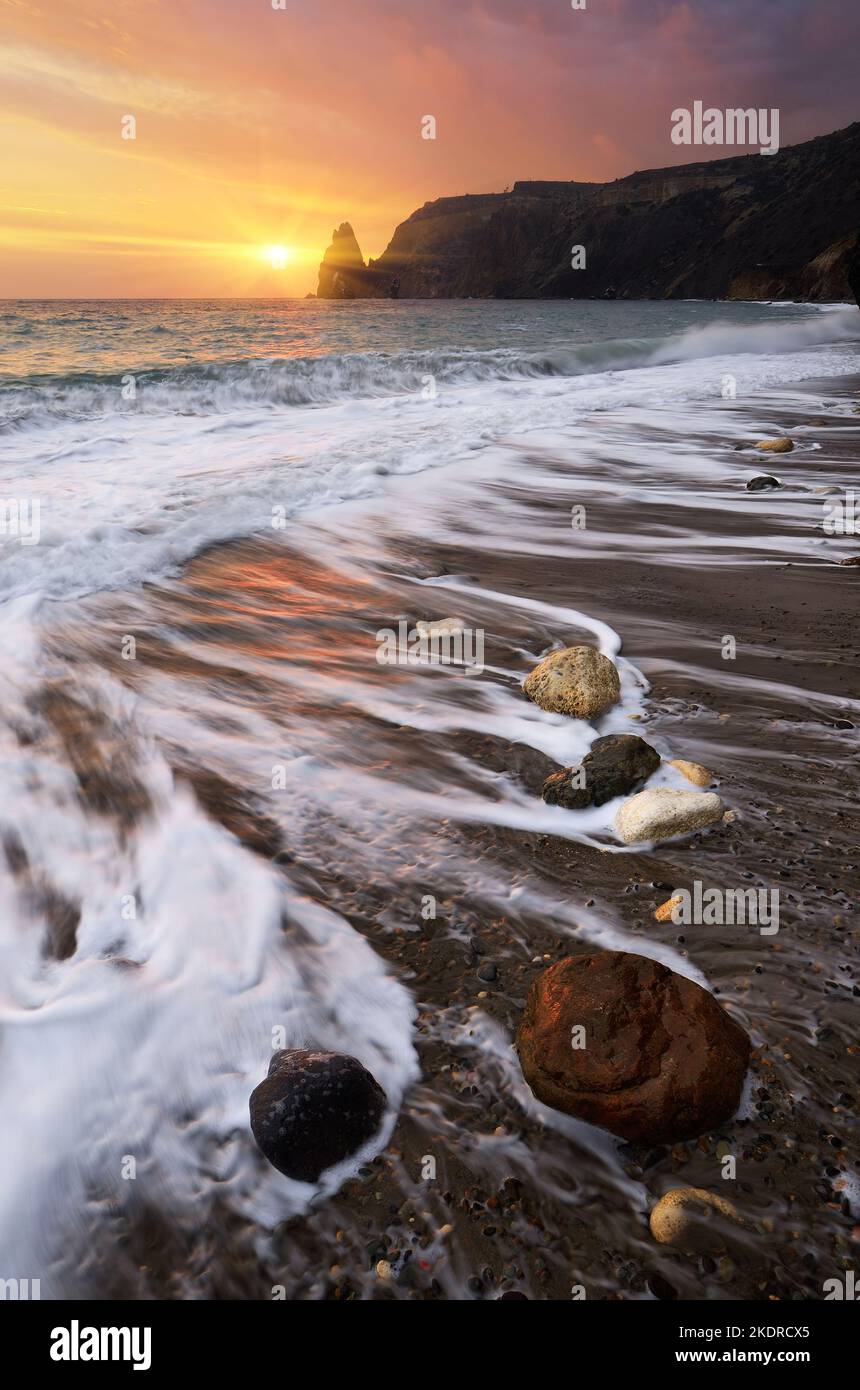 Boulder beach rock sea seascape sunset hi-res stock photography and ...