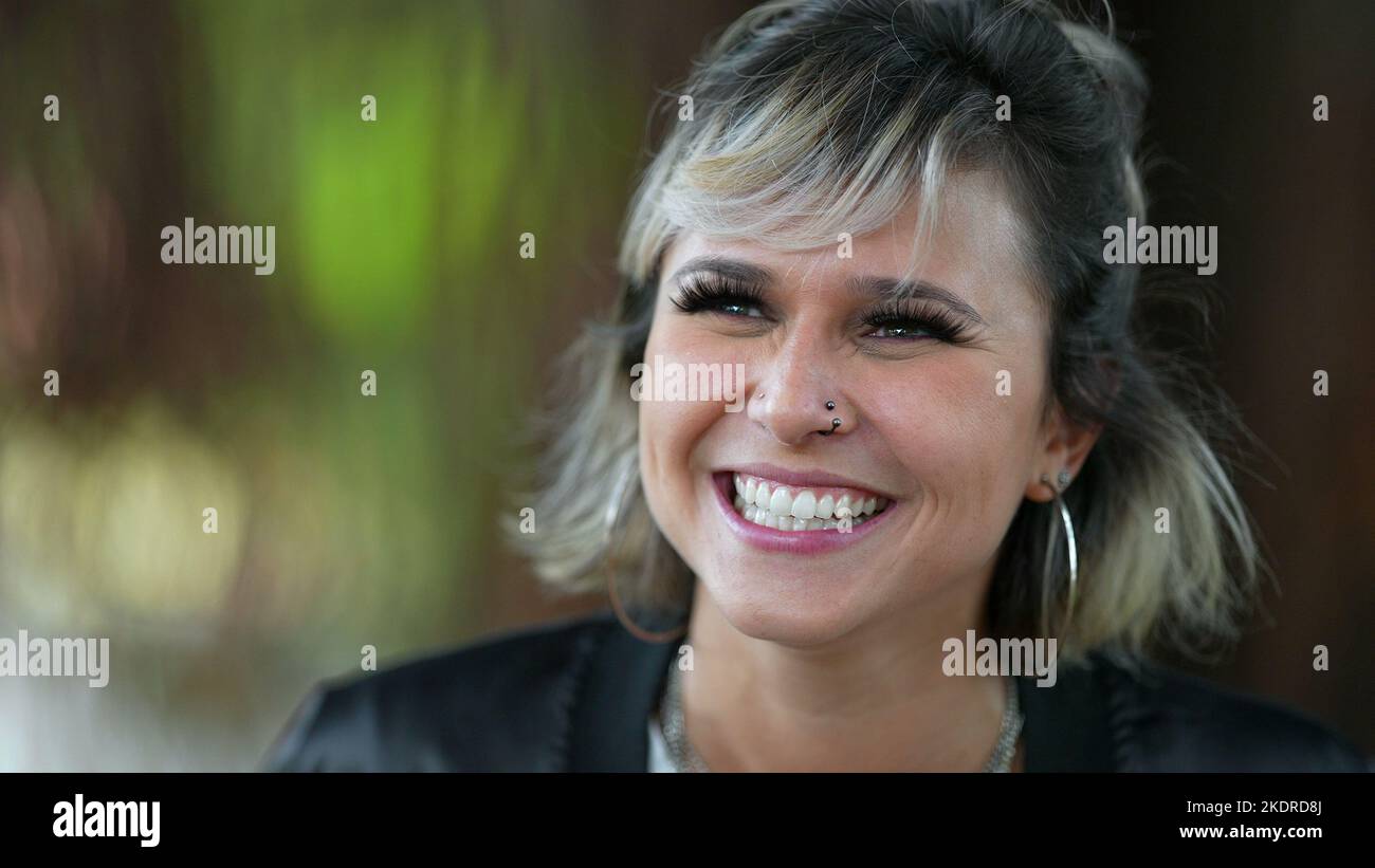 Happy blond woman smiling portrait close-up real life laugh and smile ...