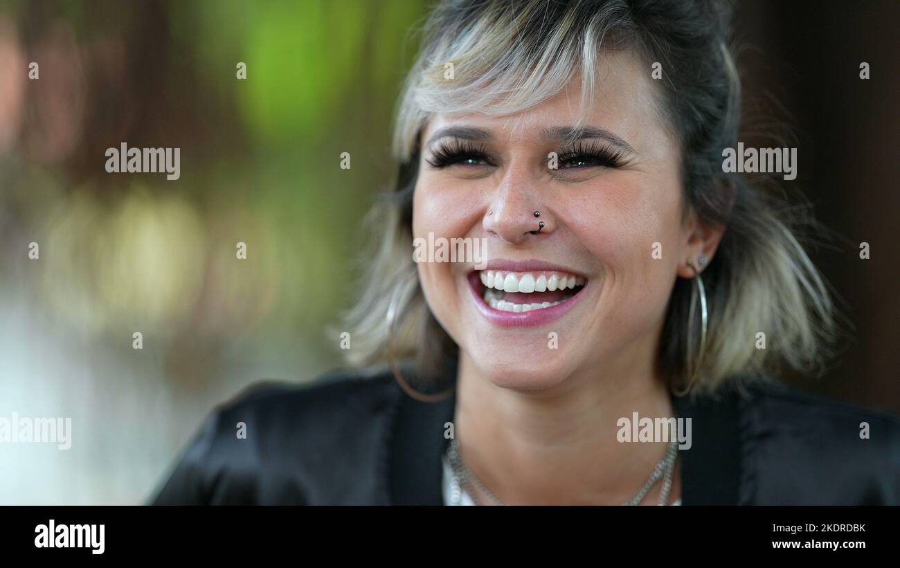 Happy blond woman smiling portrait close-up real life laugh and smile ...