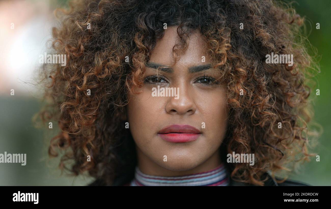 Confident Brazilian latin black woman looking at camera Stock Photo - Alamy