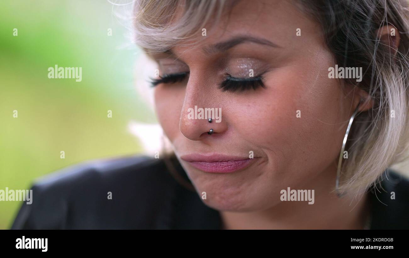 Disappointed woman face close-up expression Stock Photo - Alamy
