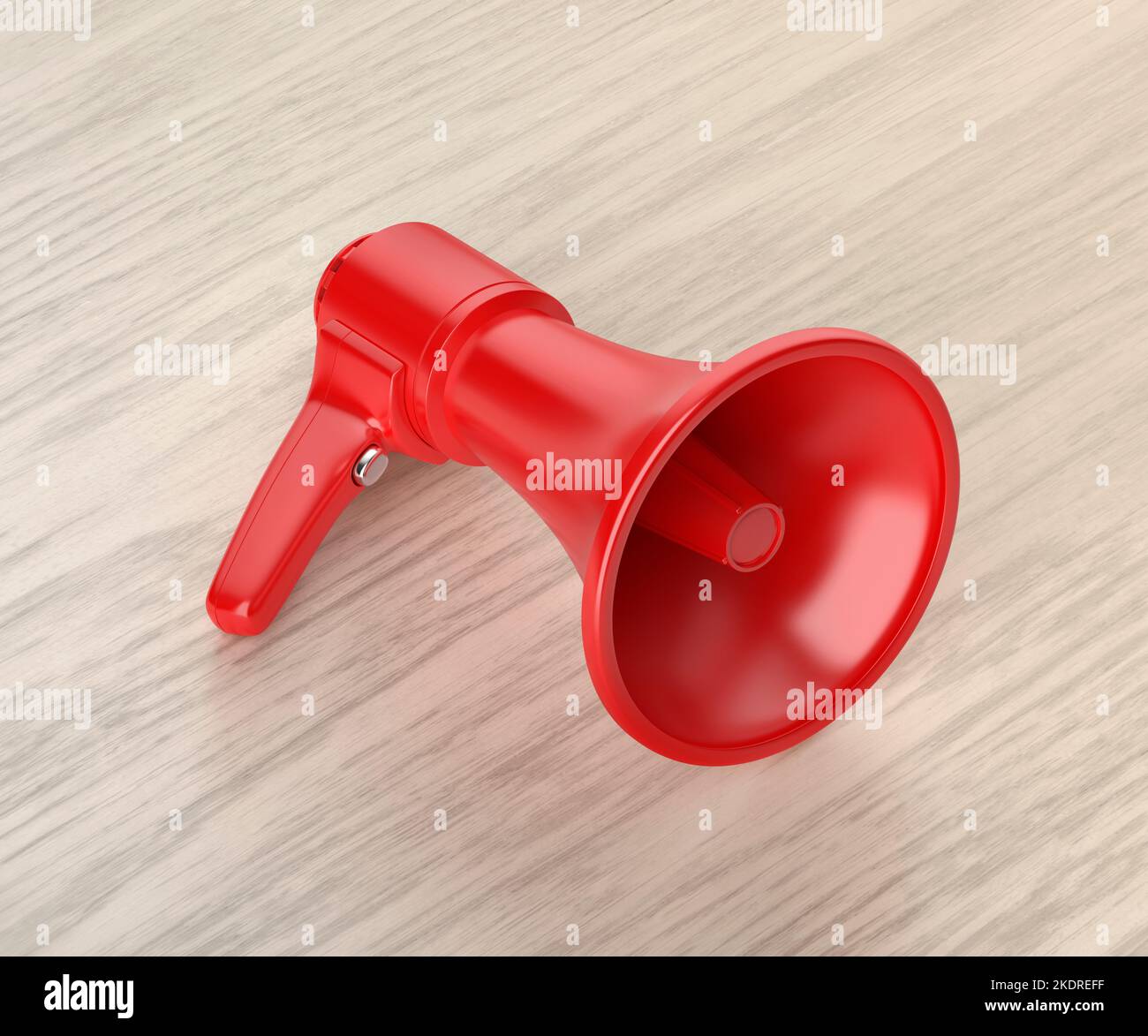 Red electric megaphone on wooden desk Stock Photo - Alamy