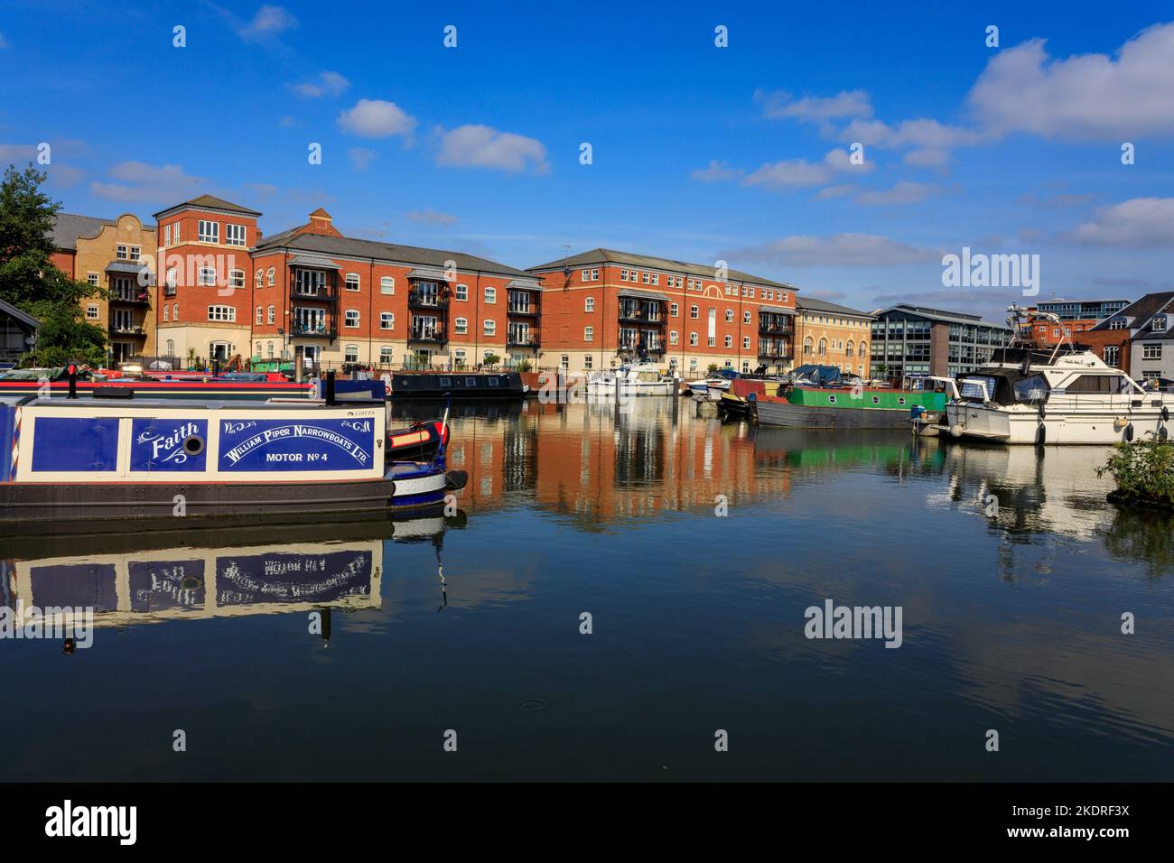 A colourful collection of narrow boats and others in the Diglis Basin ...