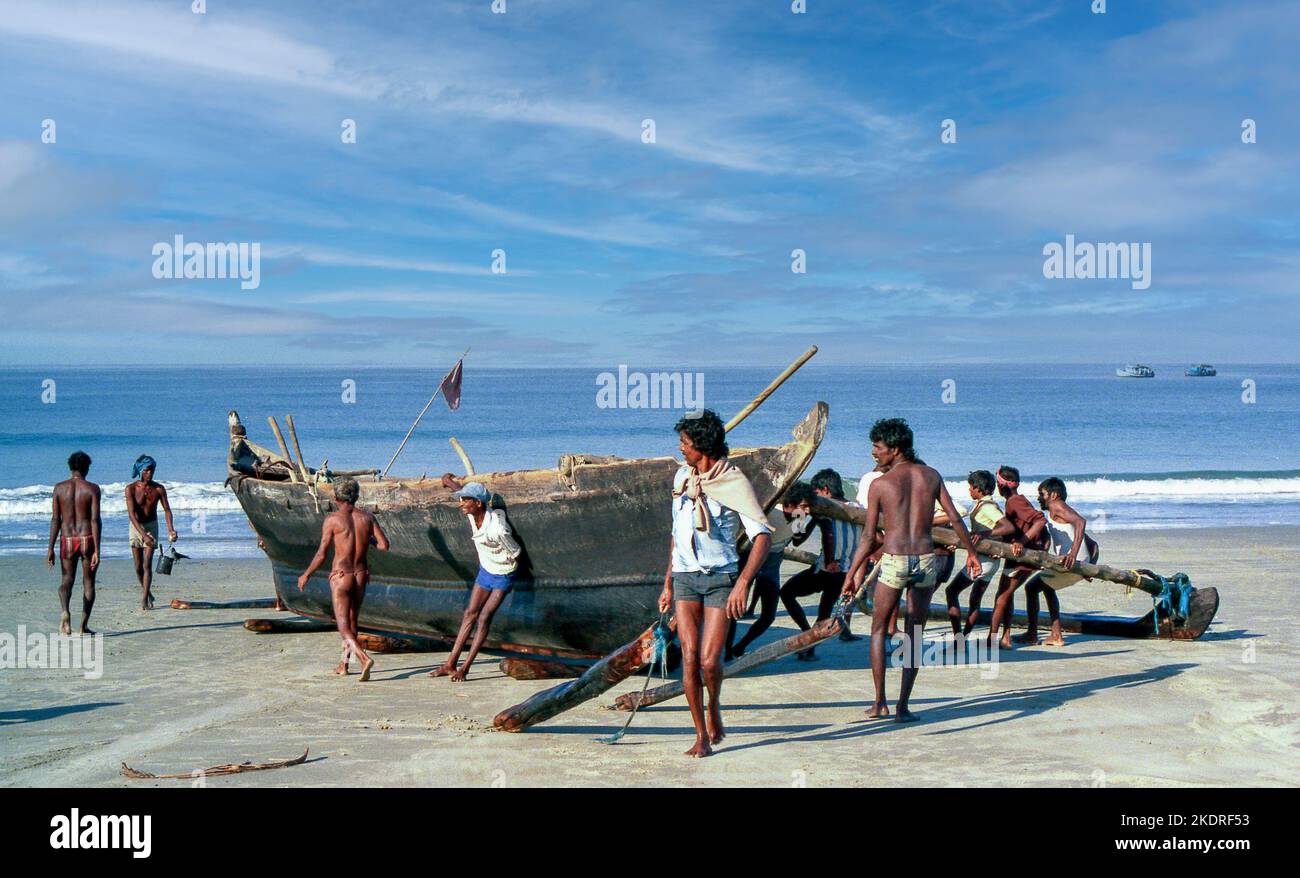 Fishing Boat and fishermen, Colva Beach, Goa, 1986 Stock Photo - Alamy