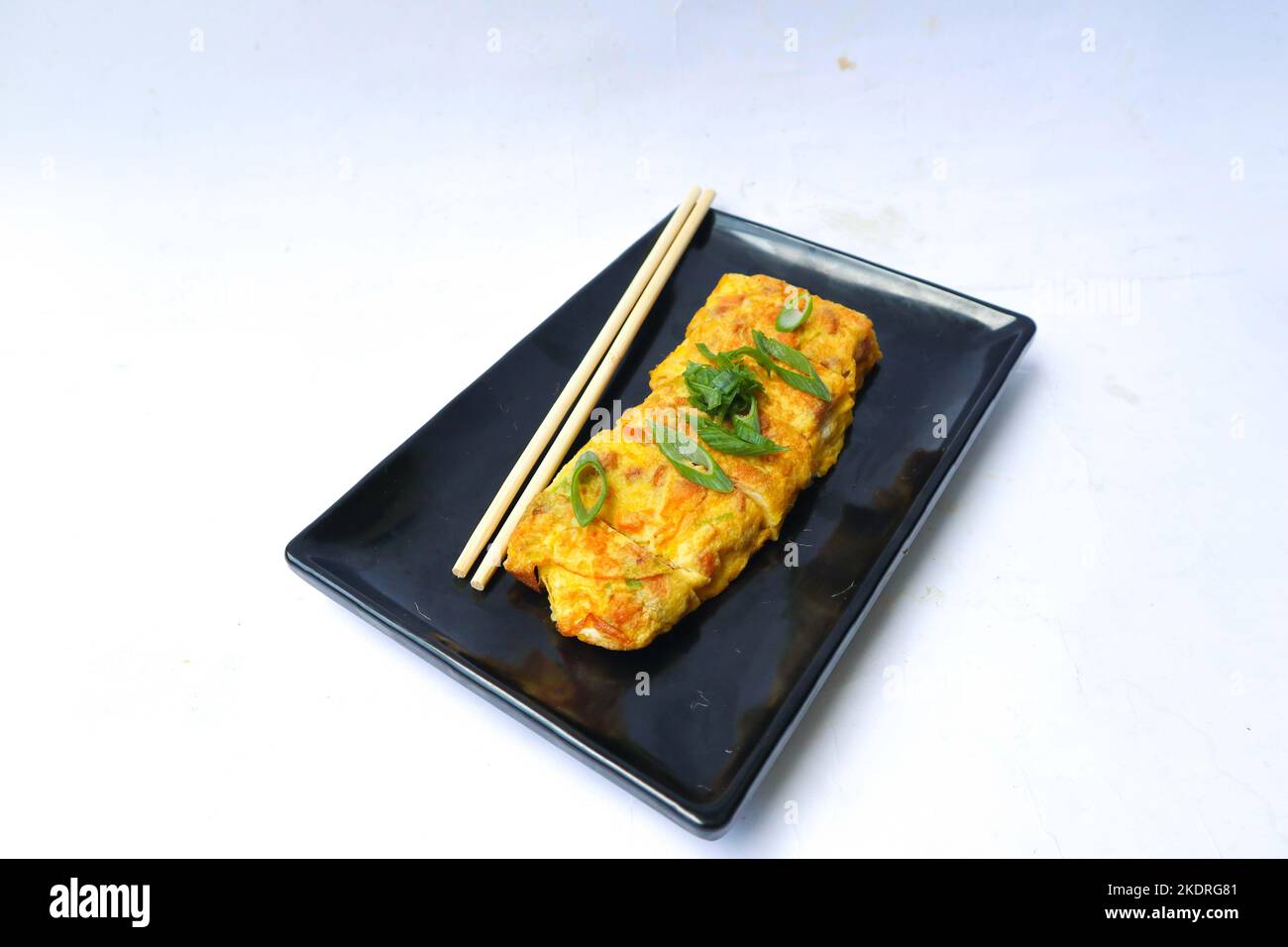 Telur dadar gulung or Tamagoyaki or Japaneses egg roll. Gyeran Mari or ...