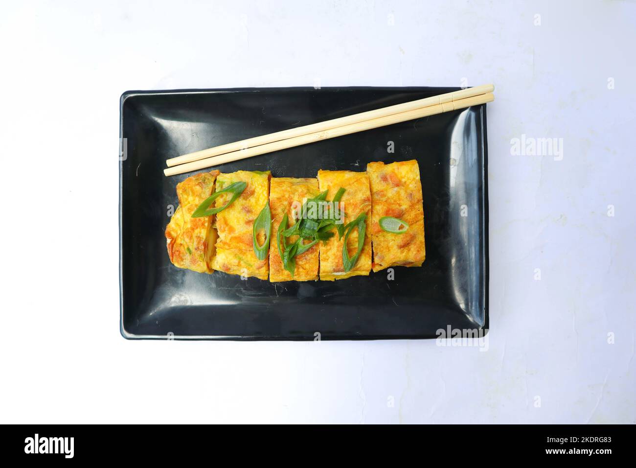 Telur dadar gulung or Tamagoyaki or Japaneses egg roll. Gyeran Mari or ...