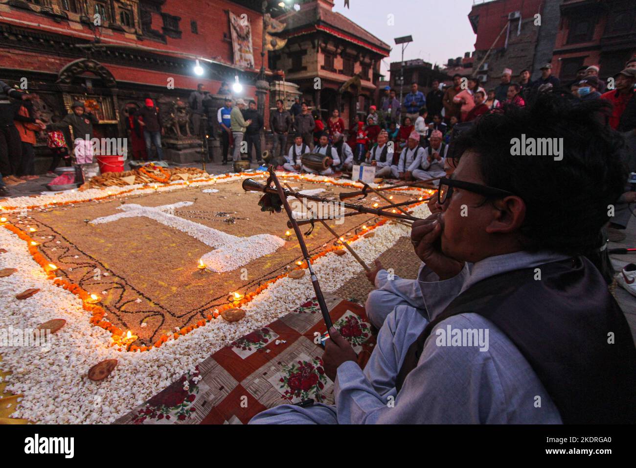 Nepal. 8th Nov, 2022. A man plays 'Karnal', a traditional musical ...