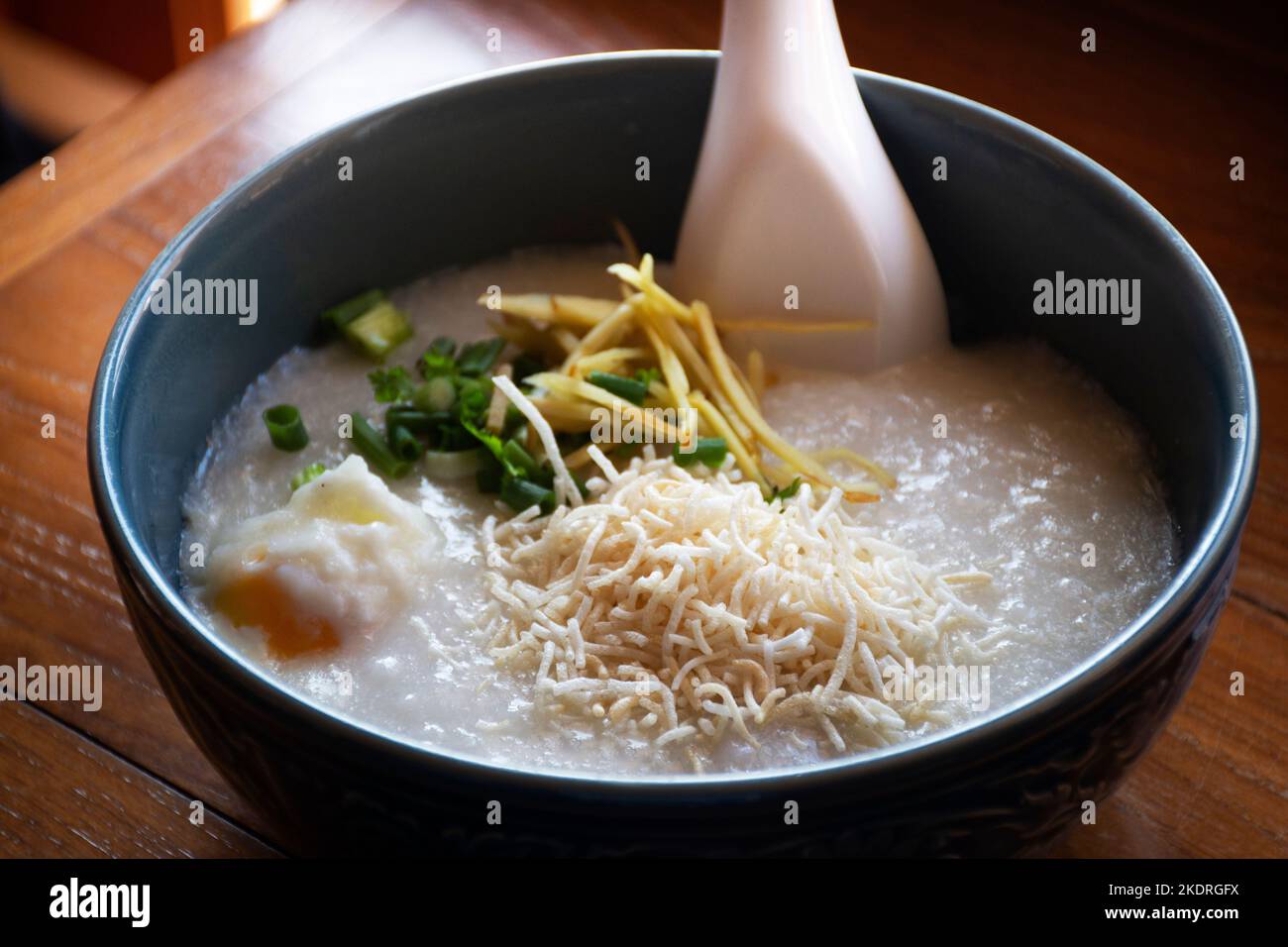 Breakfast traditional chinese food style rice porridge congee with side ...