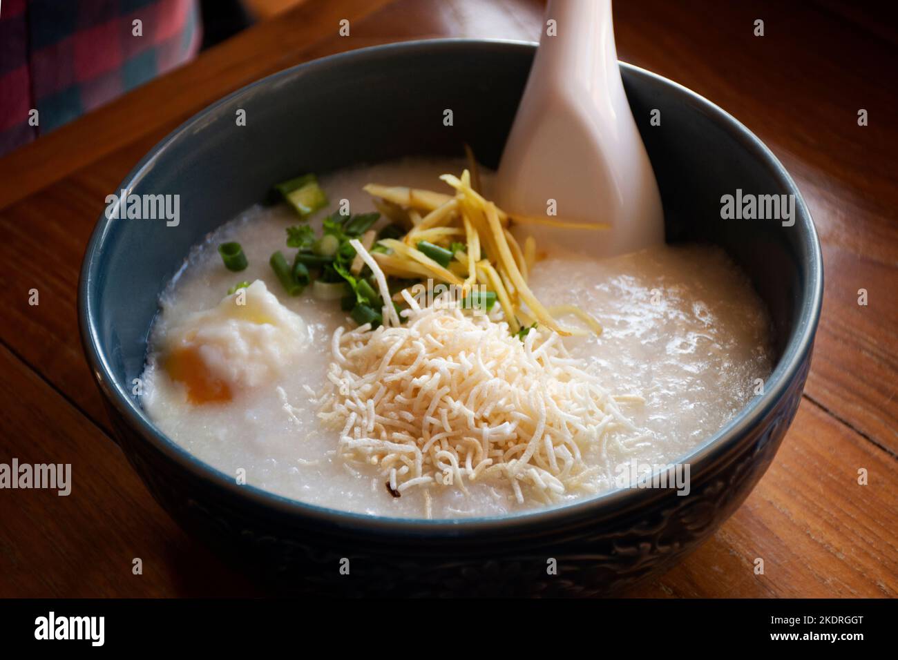 Breakfast traditional chinese food style rice porridge congee with side ...