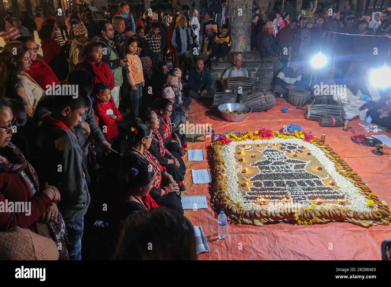 Nepal. 8th Nov, 2022. Devotees make figures of religious symbol with ...