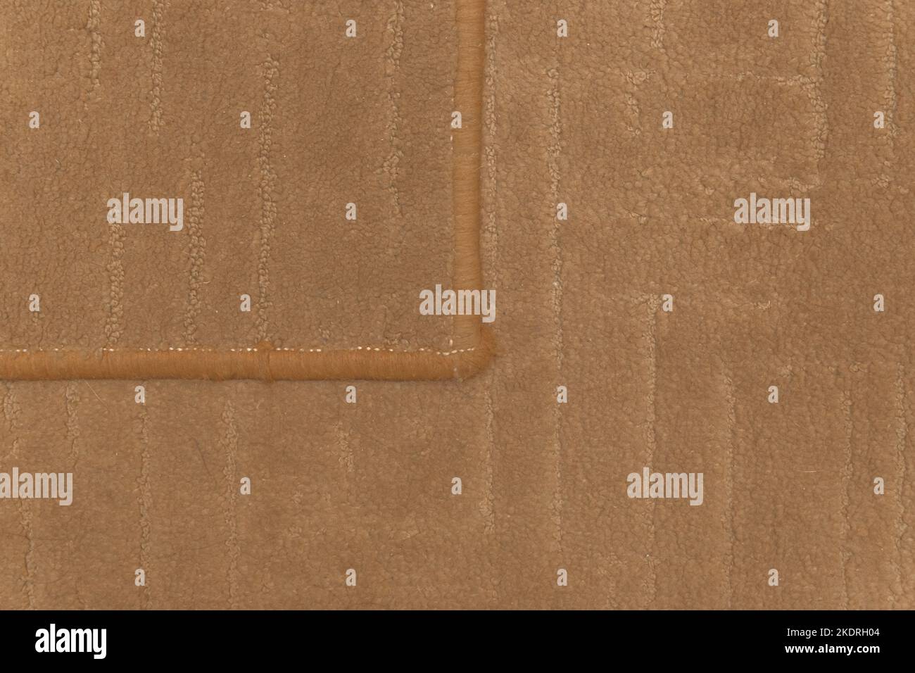 Closeup detail of brown carpet texture background Stock Photo - Alamy