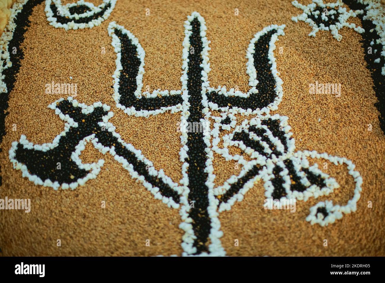 Nepal. 8th Nov, 2022. Devotees make figures of religious symbol with ...