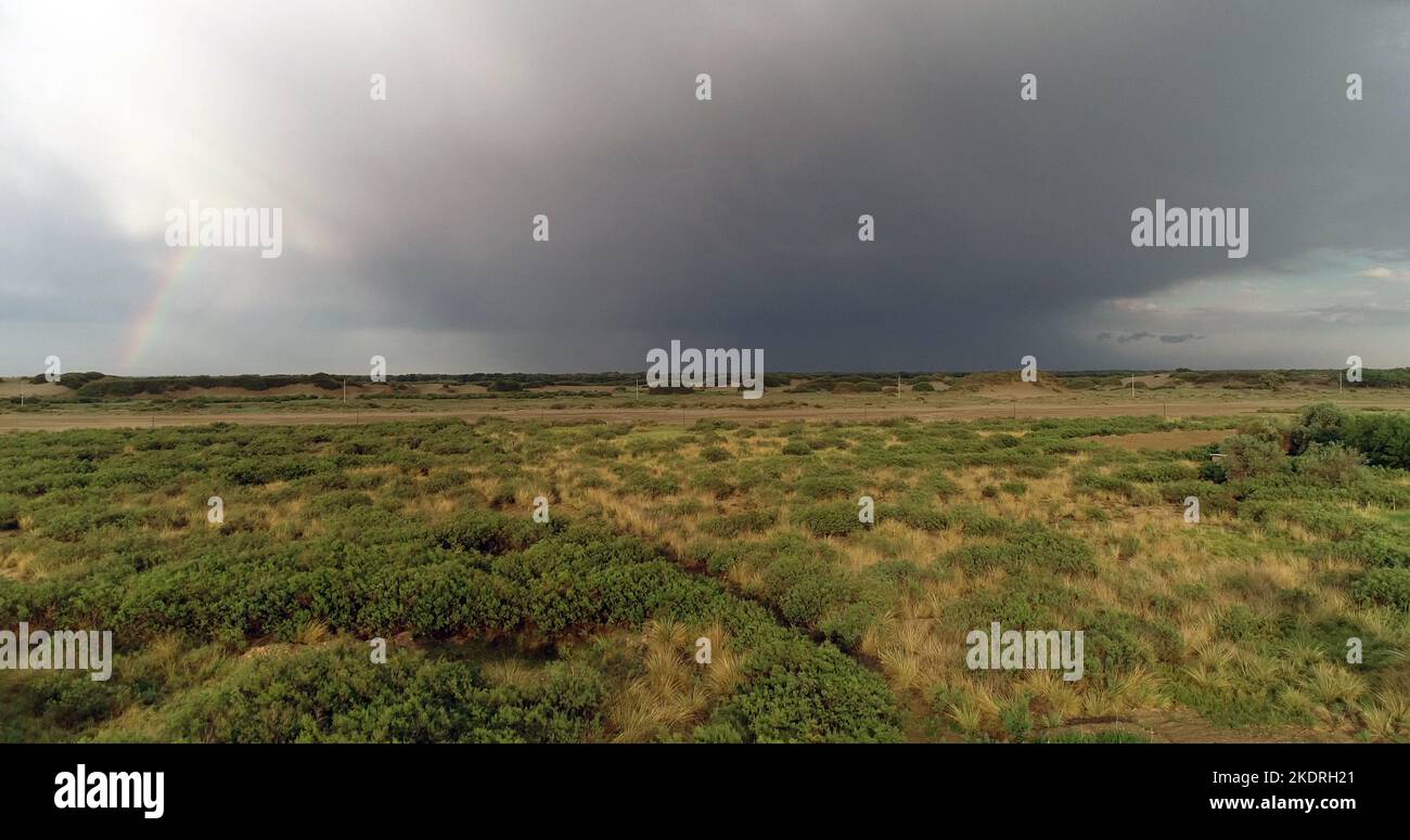 Inner Mongolia mesozoic-cenozoic miracles: half sunny rain, dark clouds ...