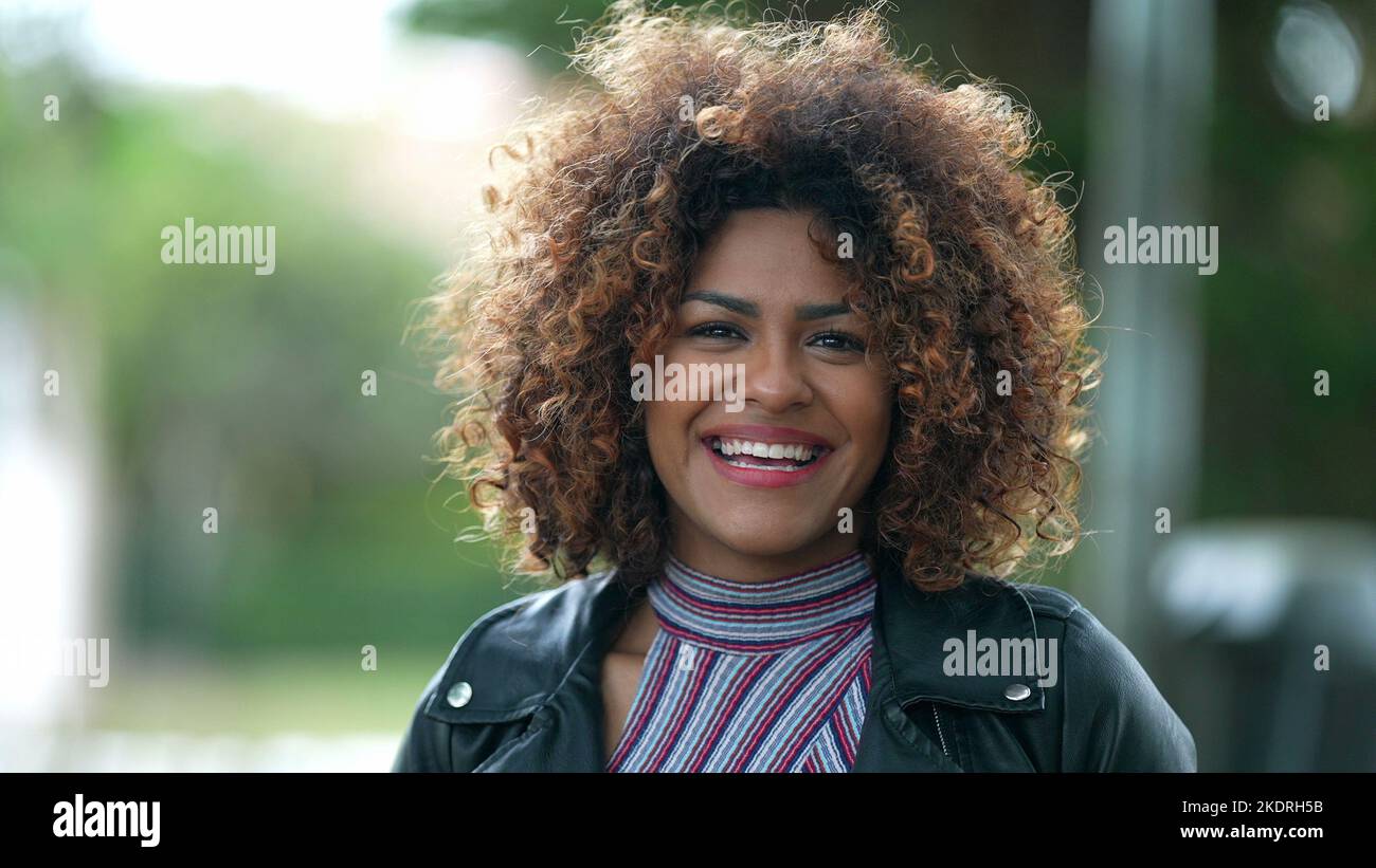Happy Brazilian woman smiling portrait face Stock Photo - Alamy