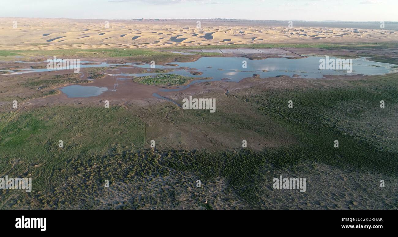 La shan right flag: the badain jaran desert scenery Stock Photo - Alamy