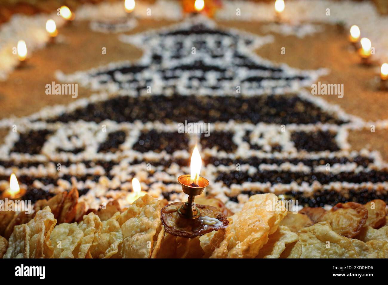 Nepal. 8th Nov, 2022. Devotees make figures of religious symbol with ...