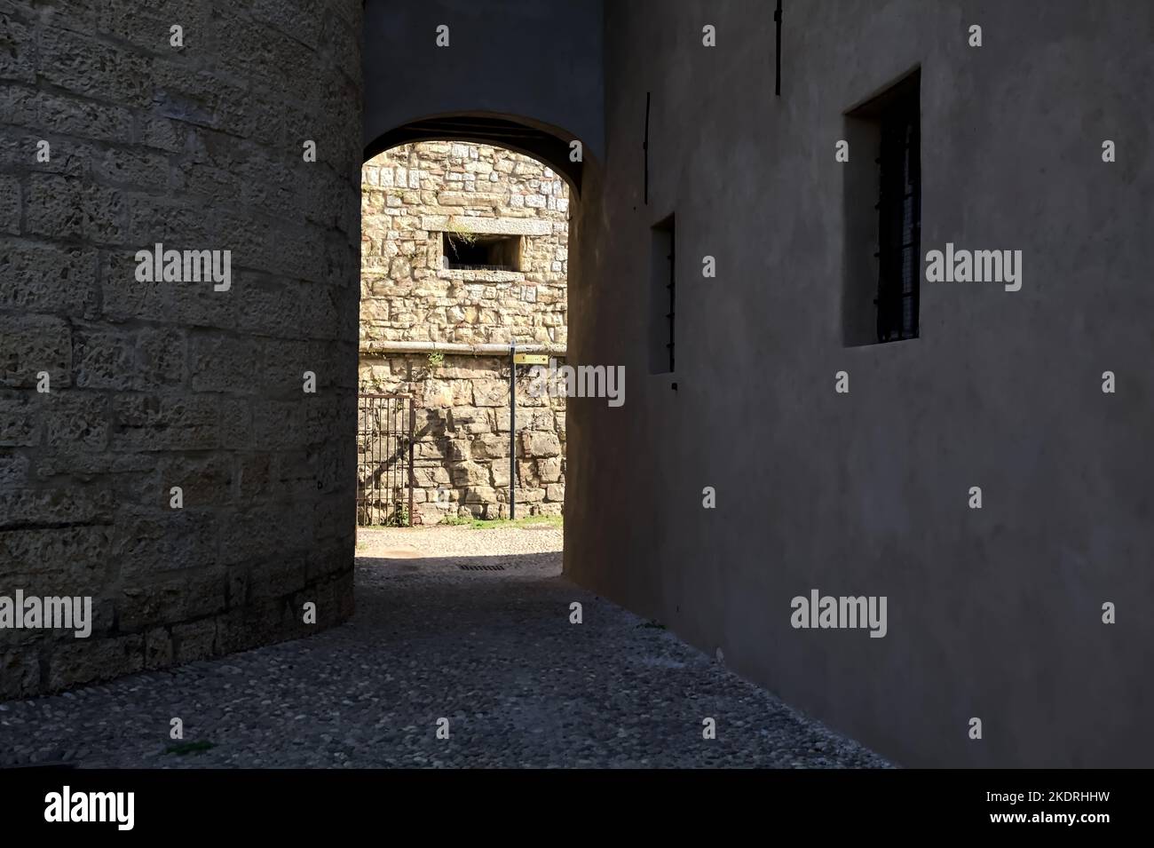 Passageway with an arch between two buildings in a castle Stock Photo ...