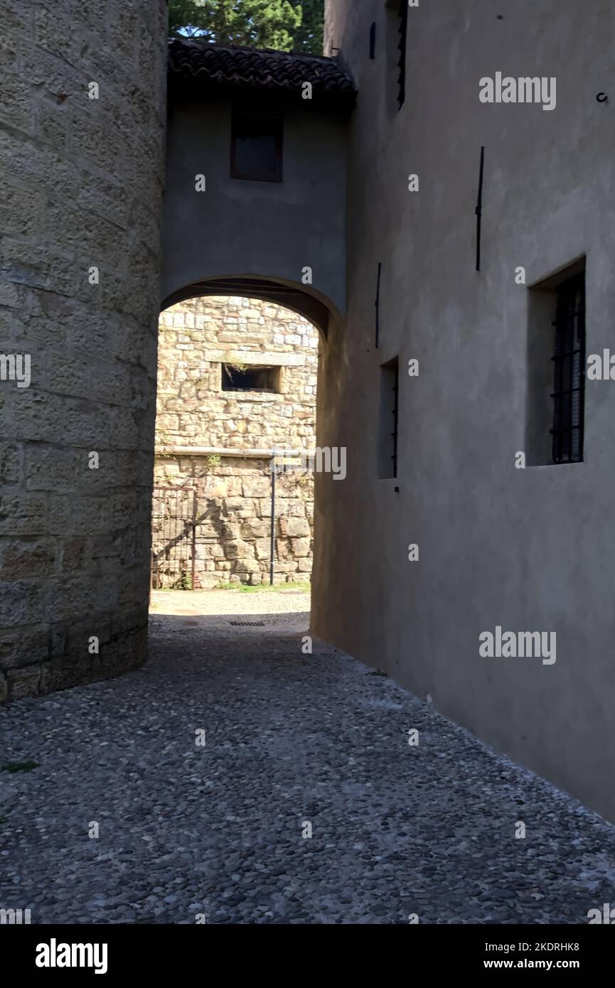 Passageway with an arch between two buildings in a castle Stock Photo ...