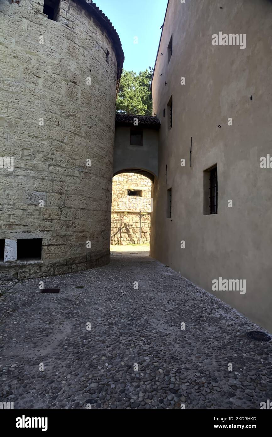 Passageway with an arch between two buildings in a castle Stock Photo ...