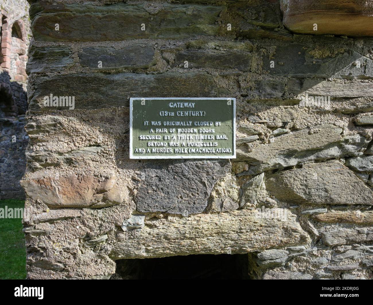 Information plaque on the wall of the medieval Skipness Castle ...