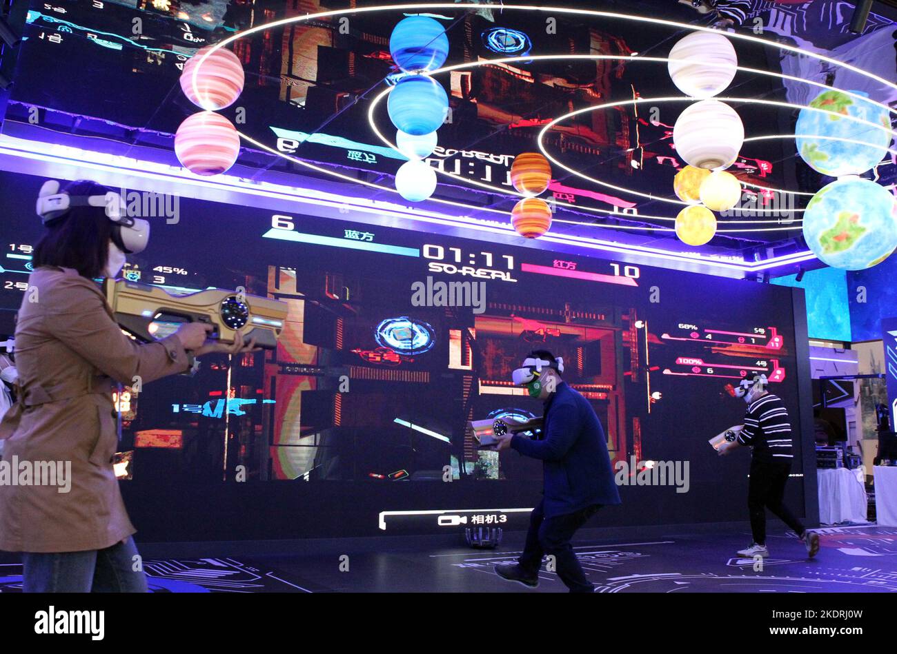Shanghai. 7th Nov, 2022. Visitors experience an interactive game with ...
