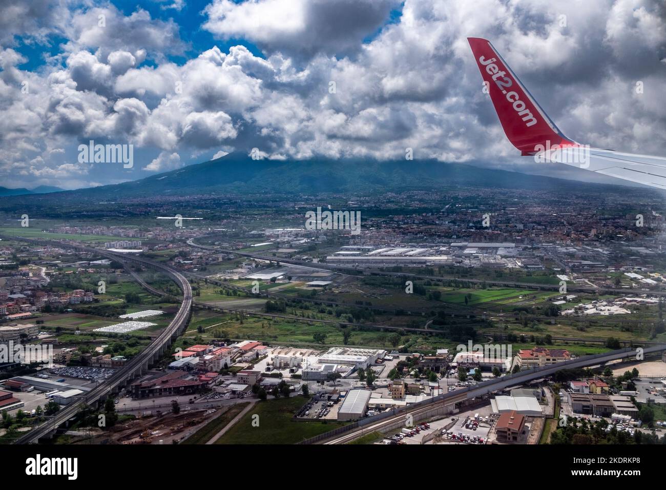 A Jet2 aircraft coming in to land at Naples airport with Vesuvius in ...