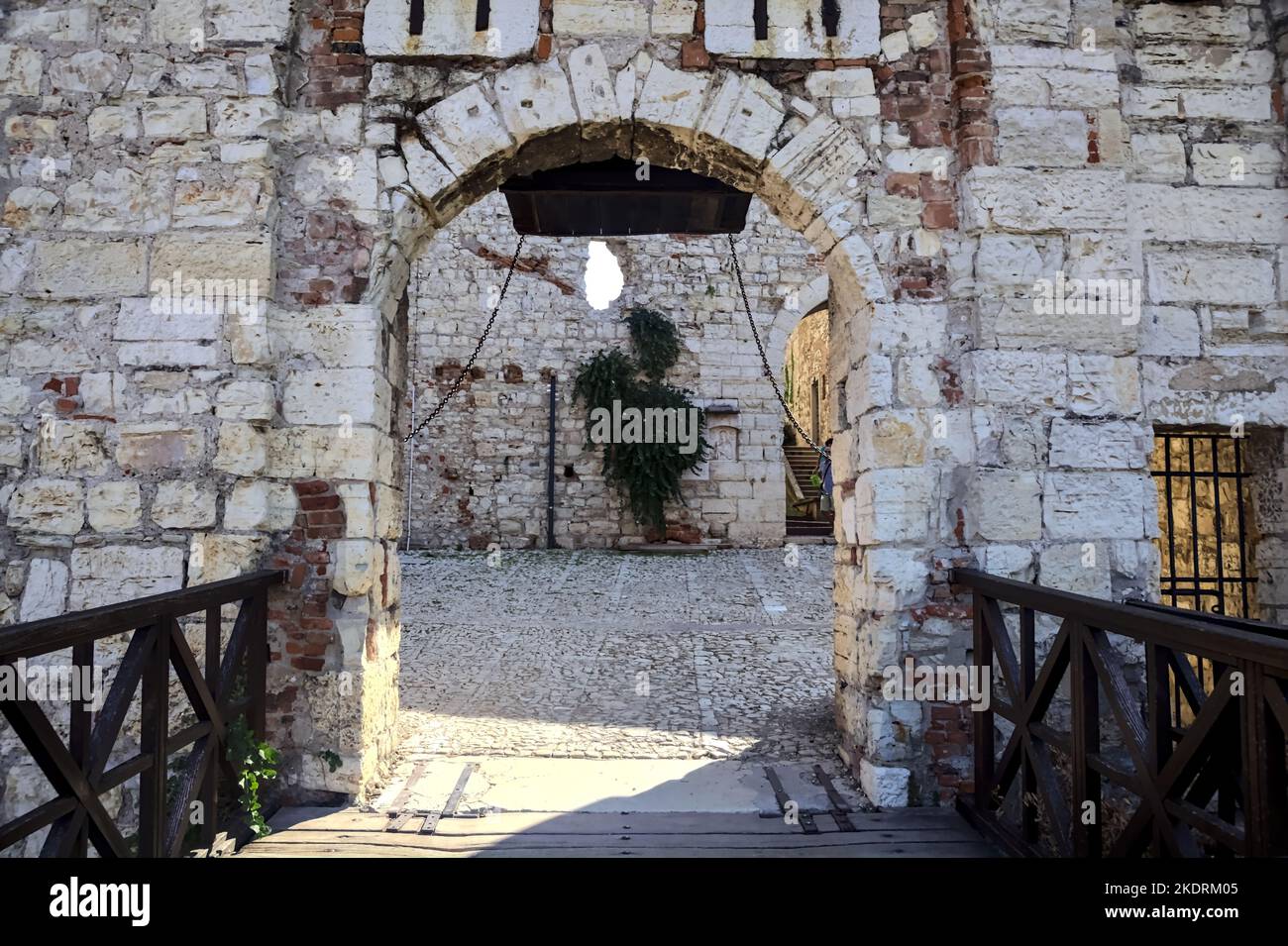 Gate of a castle with its drawbridge lowered Stock Photo - Alamy