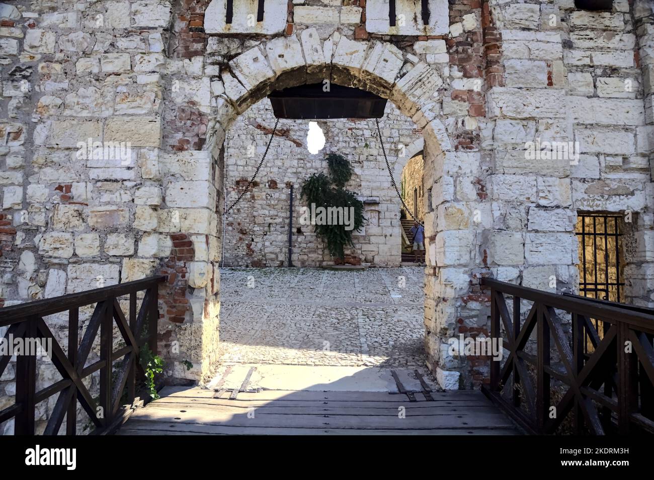 Gate of a castle with its drawbridge lowered Stock Photo - Alamy