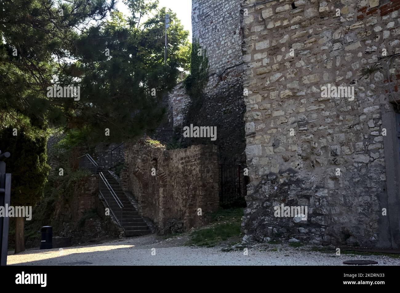 Staircase by the corner of a path in a castle Stock Photo - Alamy