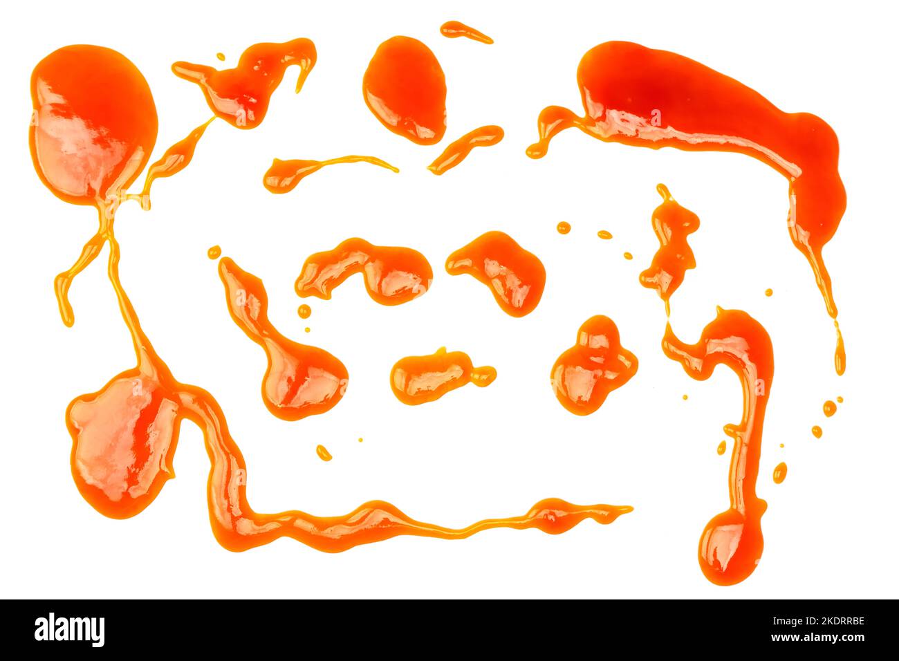 Orange sauce splashes isolated on white a background. Top view Stock ...