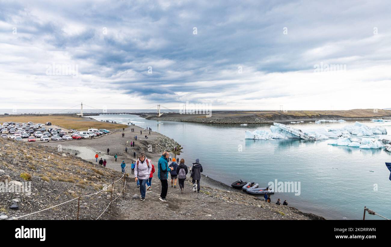 Tourists visiting Jokulsarlon Glacial lagoon, popular Iceland naturally ...