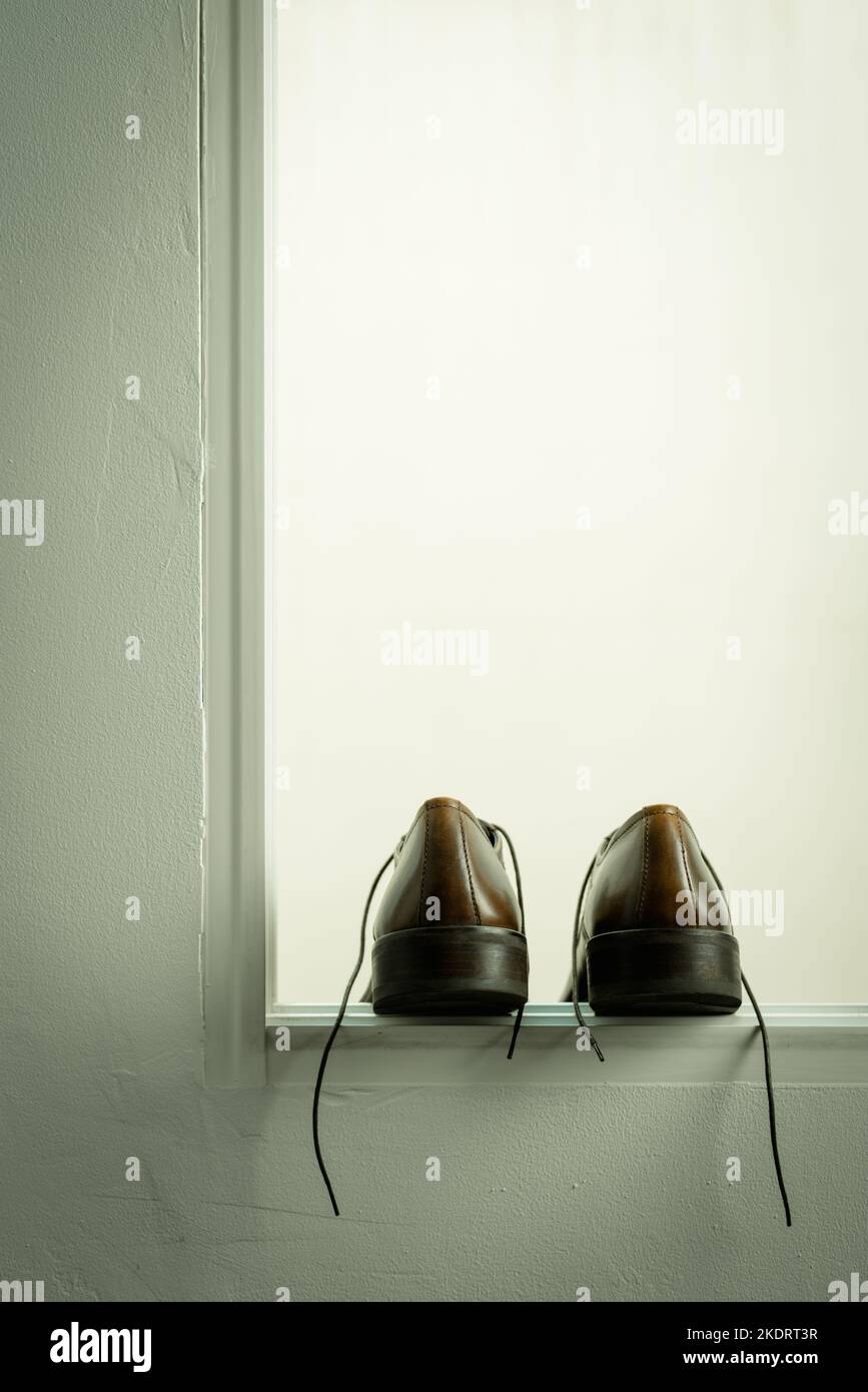 Brown leather man's shoes in the open window Stock Photo - Alamy