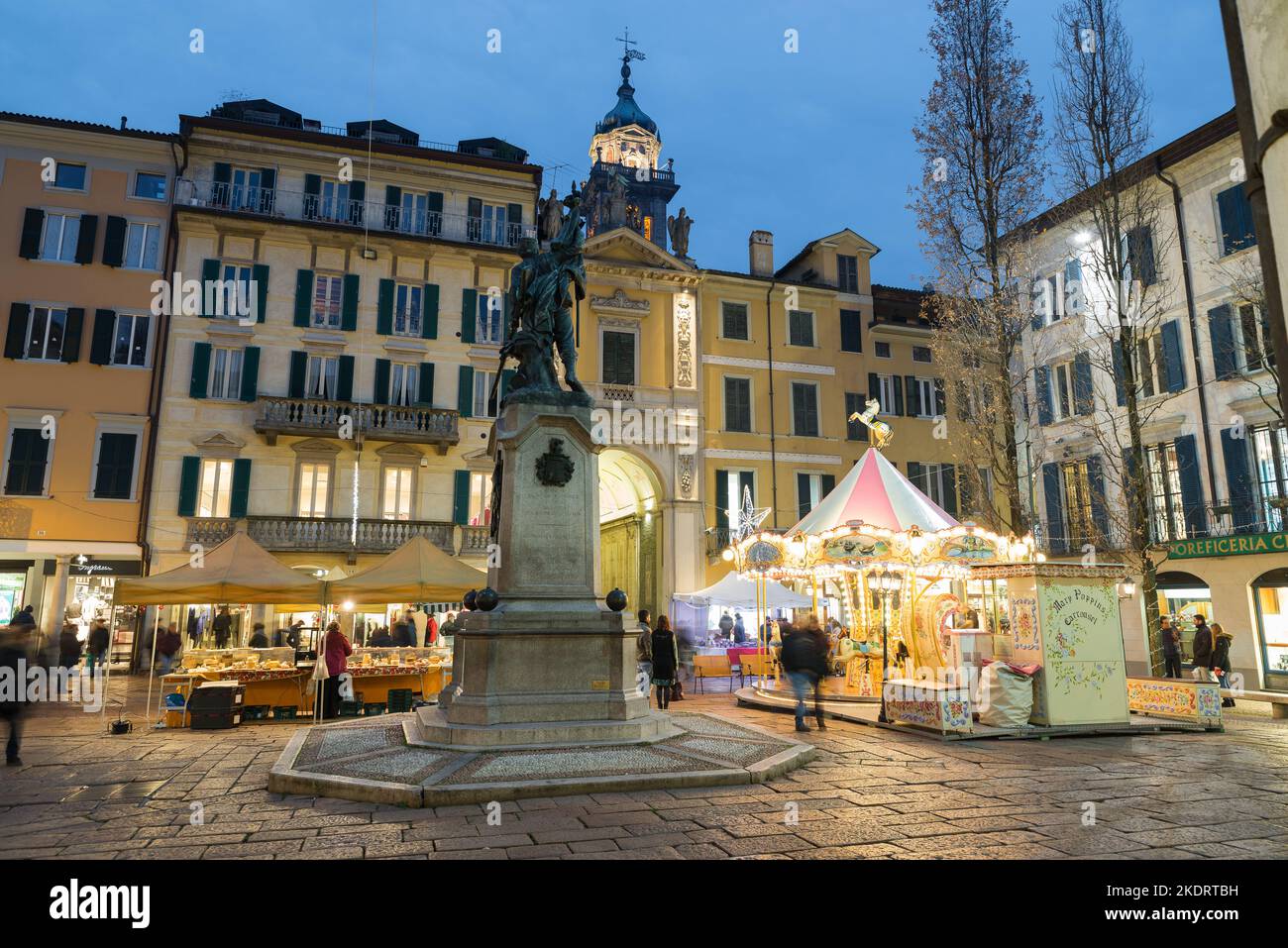 Christmas market at dusk. Varese, Italy. City street with christmas ...