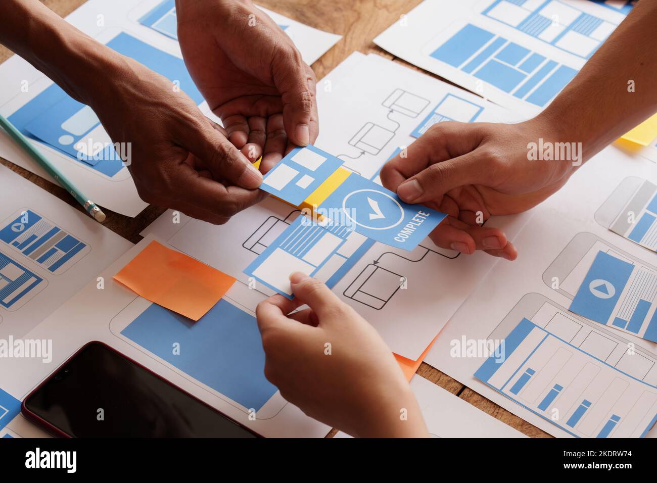 Group of ux developer and ui designer brainstorming about app interface ...