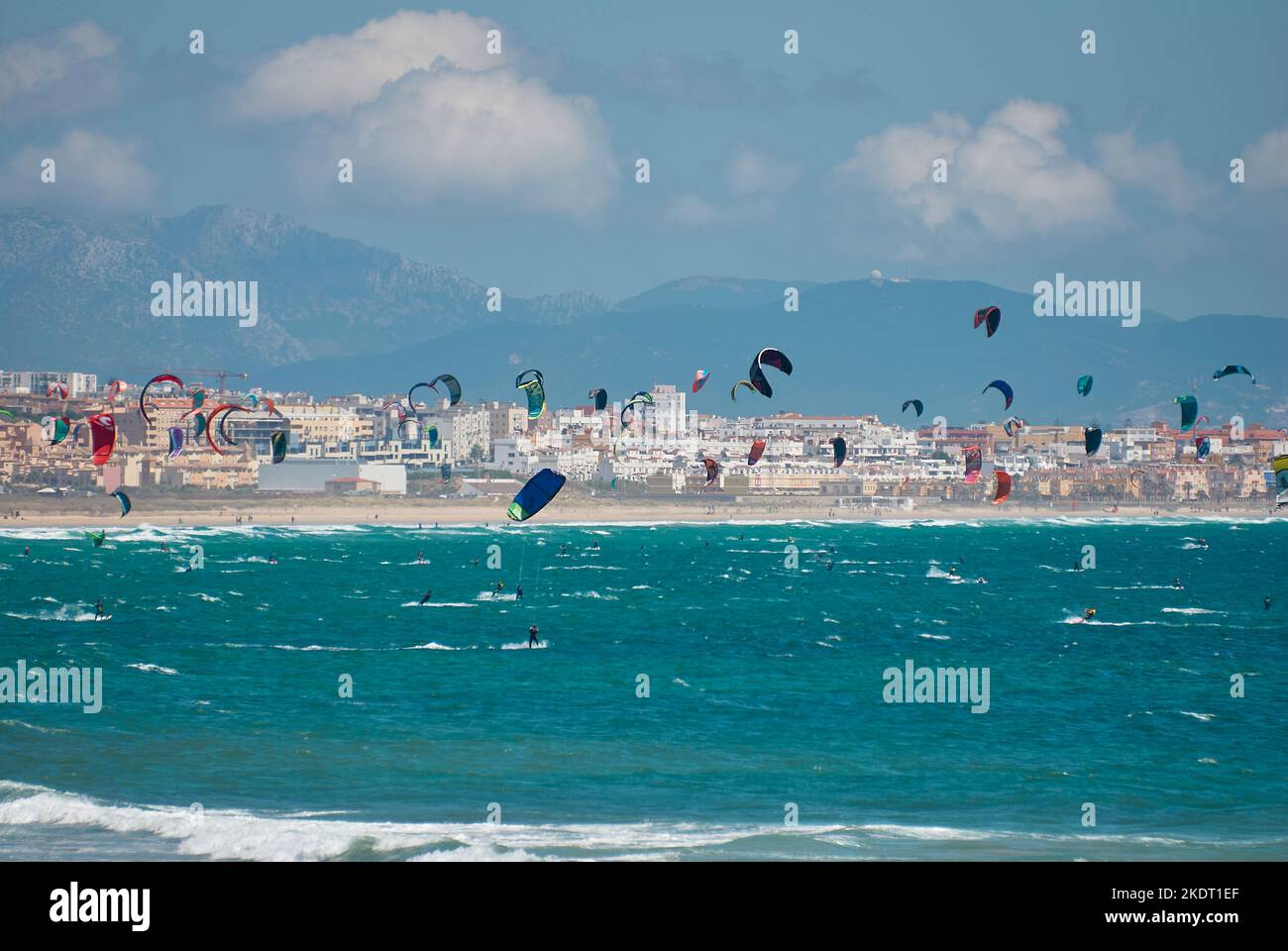 Colorful kites at the coast of the atlantic ocean in Tarifa, a popular ...