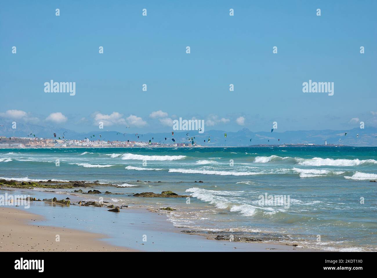 Colorful kites at the coast of the atlantic ocean in Tarifa, a popular ...