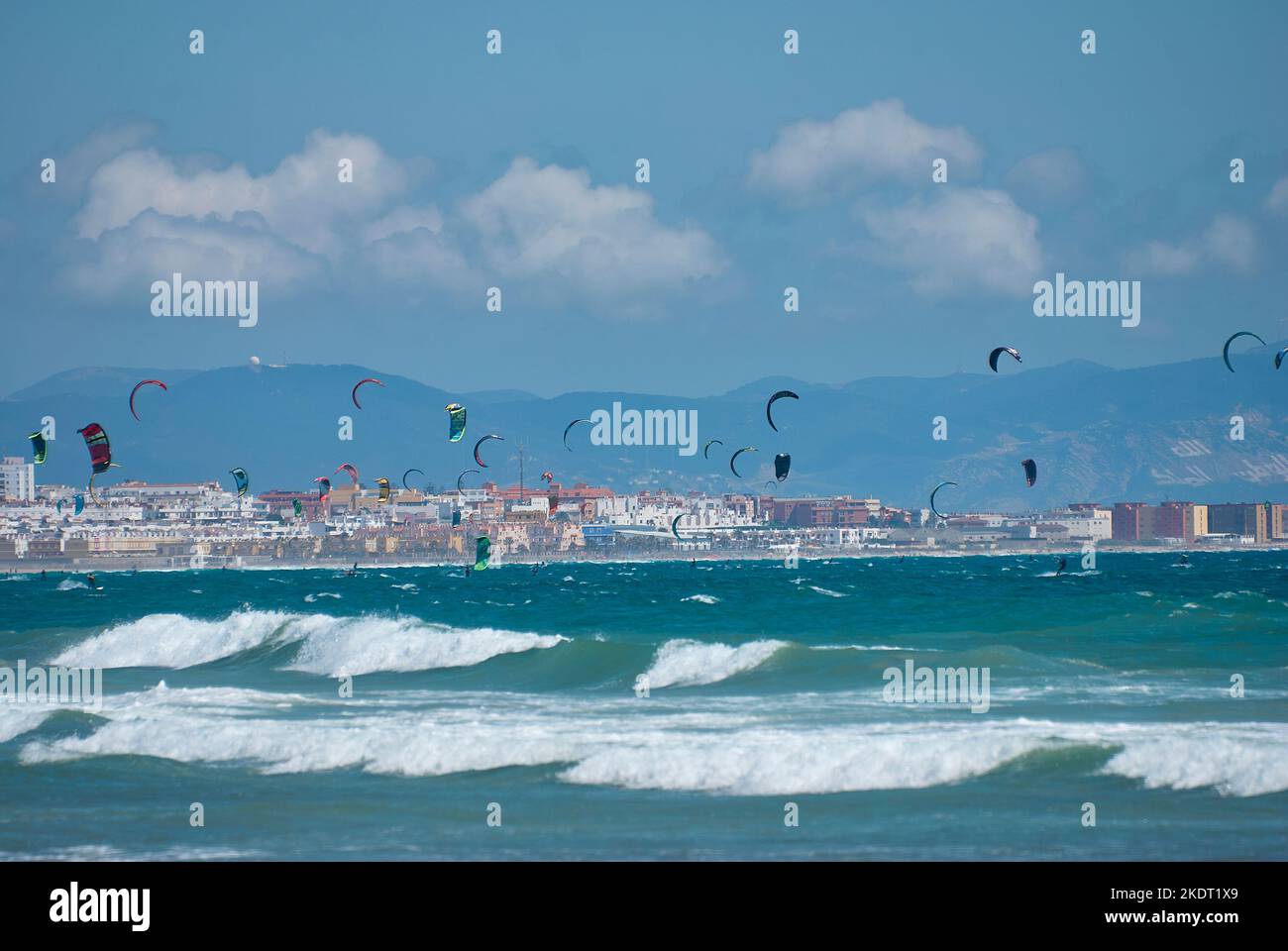 Colorful kites at the coast of the atlantic ocean in Tarifa, a popular ...