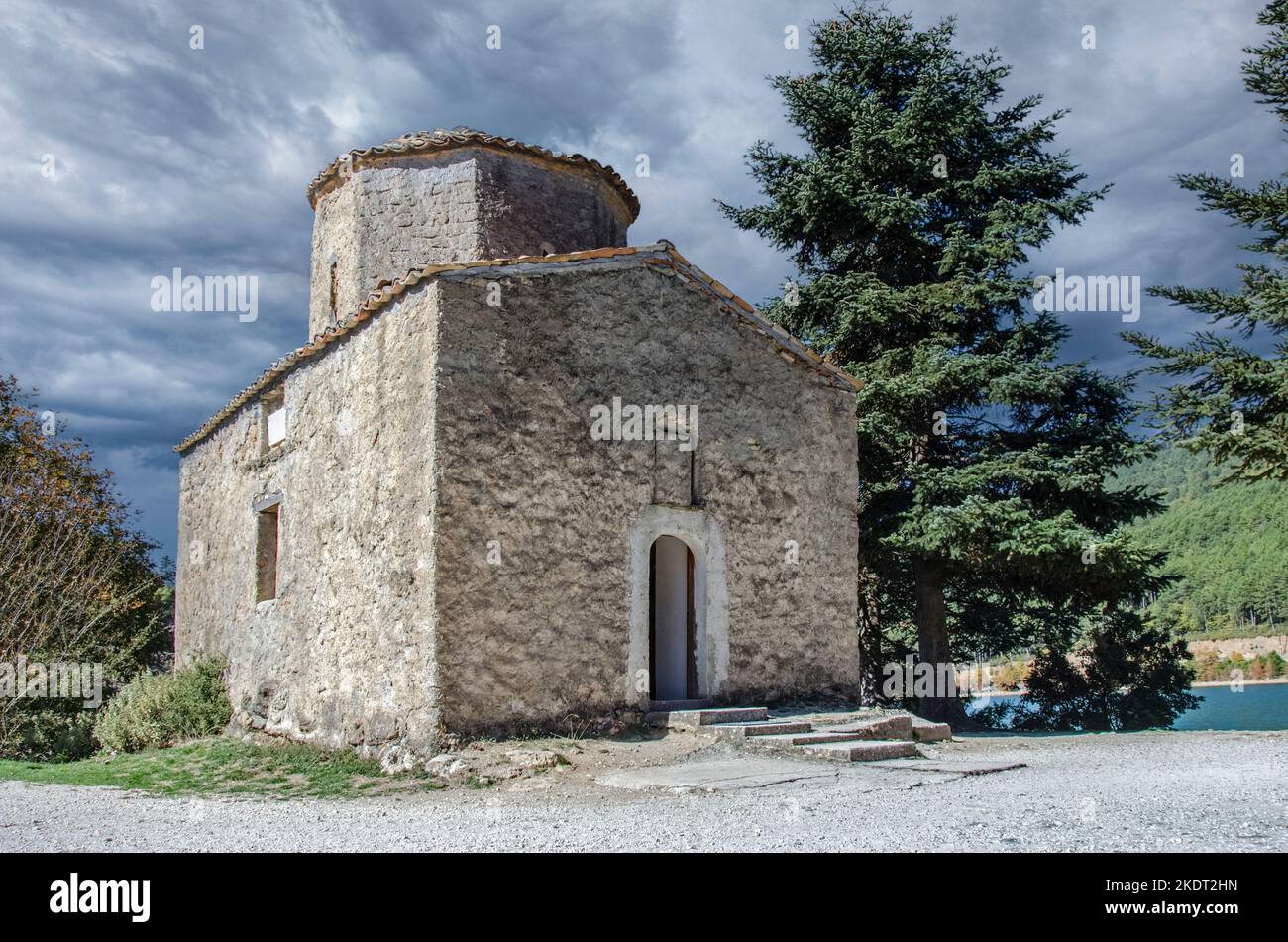 Small stone chapel of St. Fanourios on lake Doxal in Ancient Feneos of ...