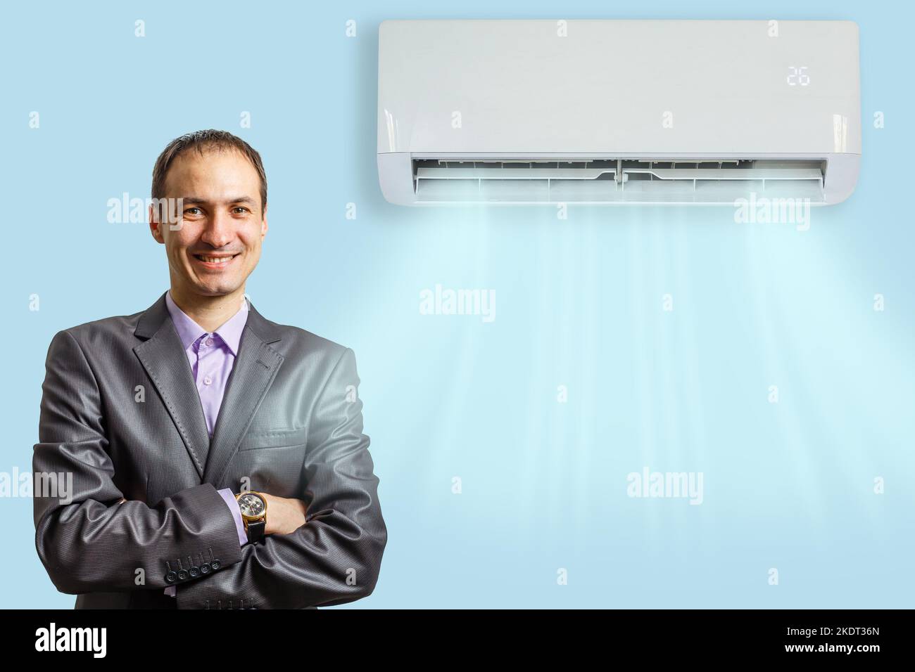 man under the air conditioner Stock Photo - Alamy