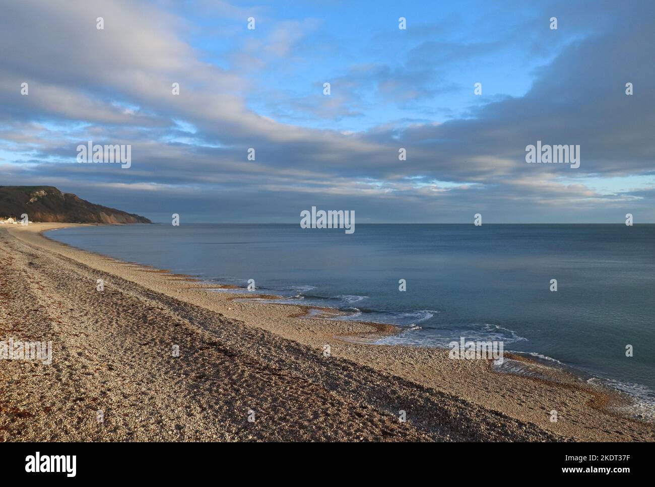 The waves in the sea create strange shapes in the pebble beach at ...