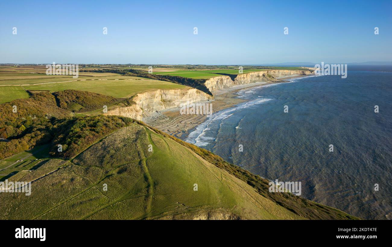 Aerial view of the limestone cliffs and beach at Southerndown and ...