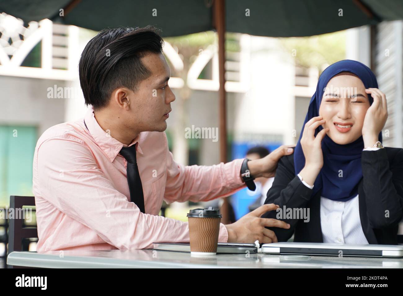 Sick young businesswoman having allergic reaction or seasonal infection ...