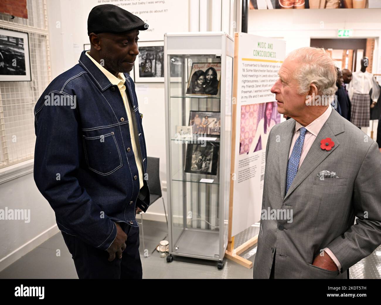 King Charles III talks with basketball coach Norman Francis during a ...