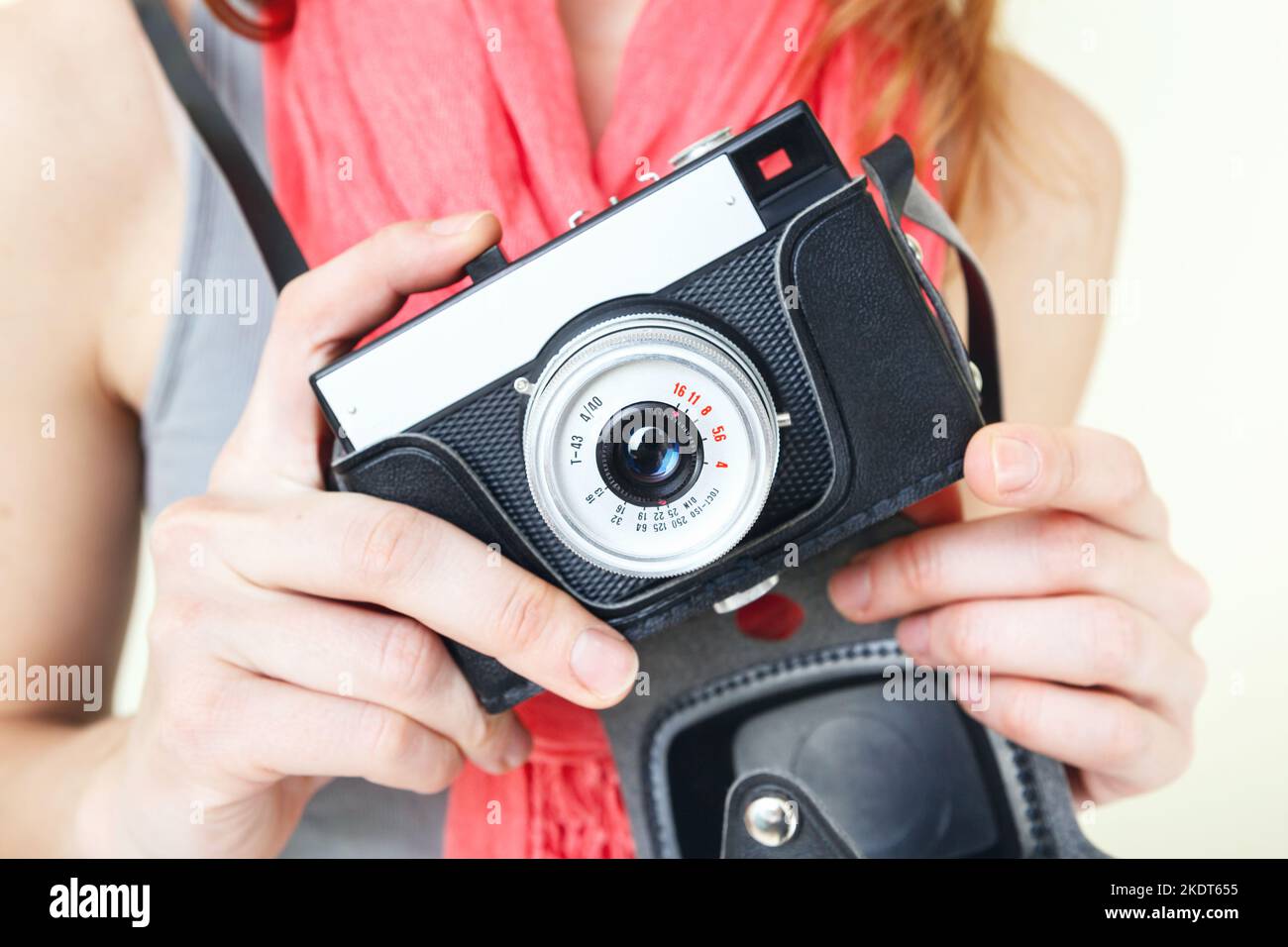 Close-up of female photographer with old Lomo camera in her hand Stock ...