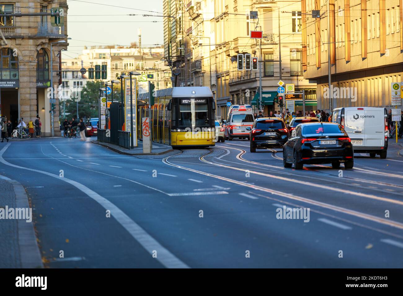 Berlin, Germany - October 7, 2022: Yellow tram drives along a street ...