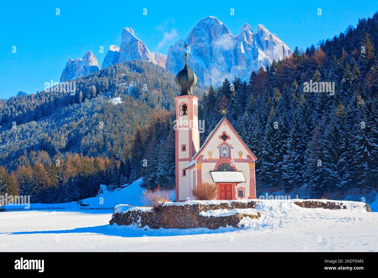 Winter view of the Church of St. Johann in Ranui with Puez-Odle ...