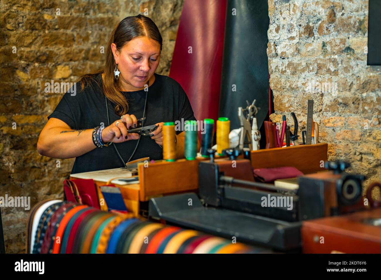 Interior of leather work shop in Rome Stock Photo - Alamy